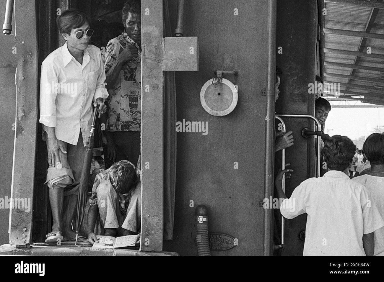 At Surat Thani railroad station in Thailand: Unimpressed by the hustle ...