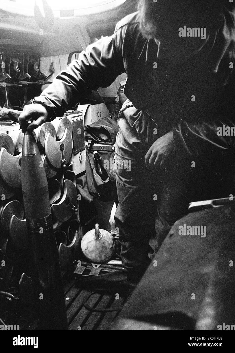 Troop exercise: Inside the tank, the loader has a grenade ready ...