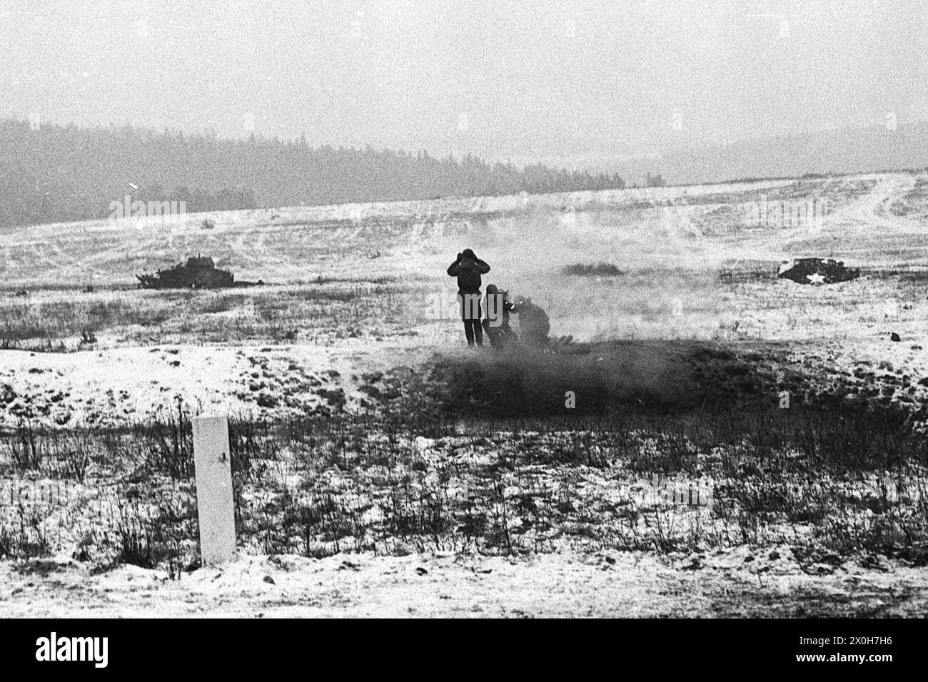Troop exercise: While the tank gunner fires, the loader and security ...