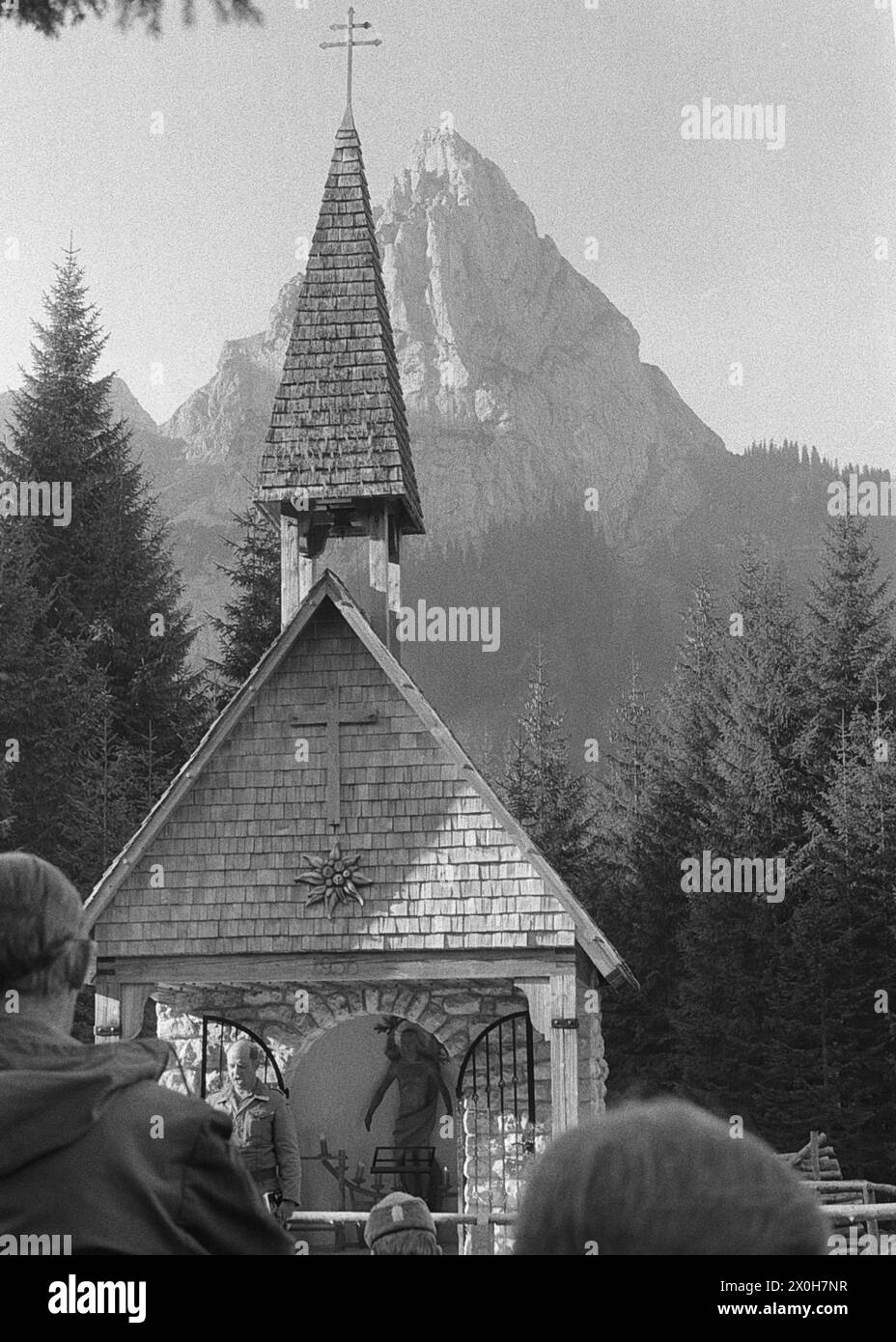 Field service in front of an impressive backdrop. [automated ...