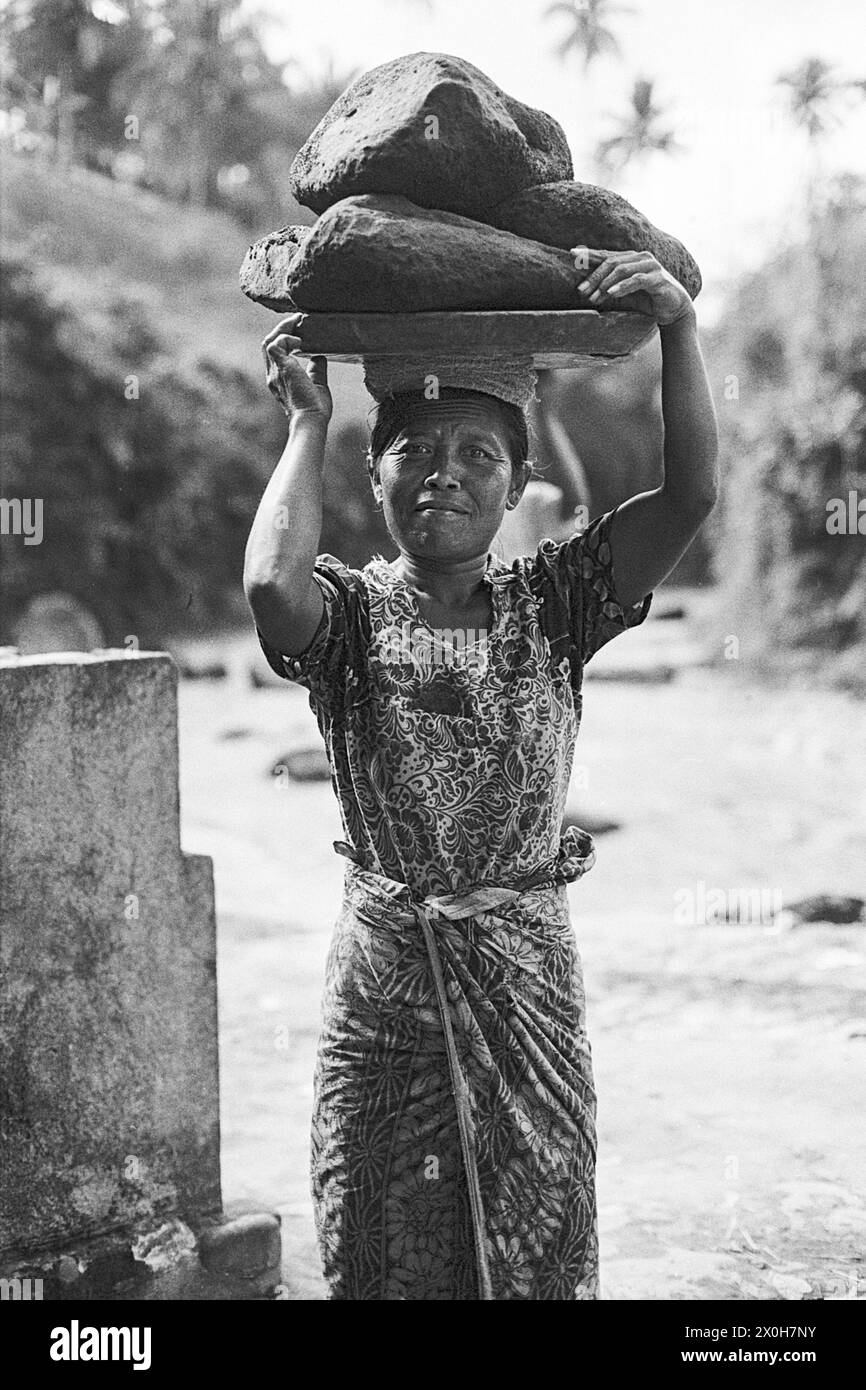 It's unbelievable that this petite Balinese woman carries the heavy ...