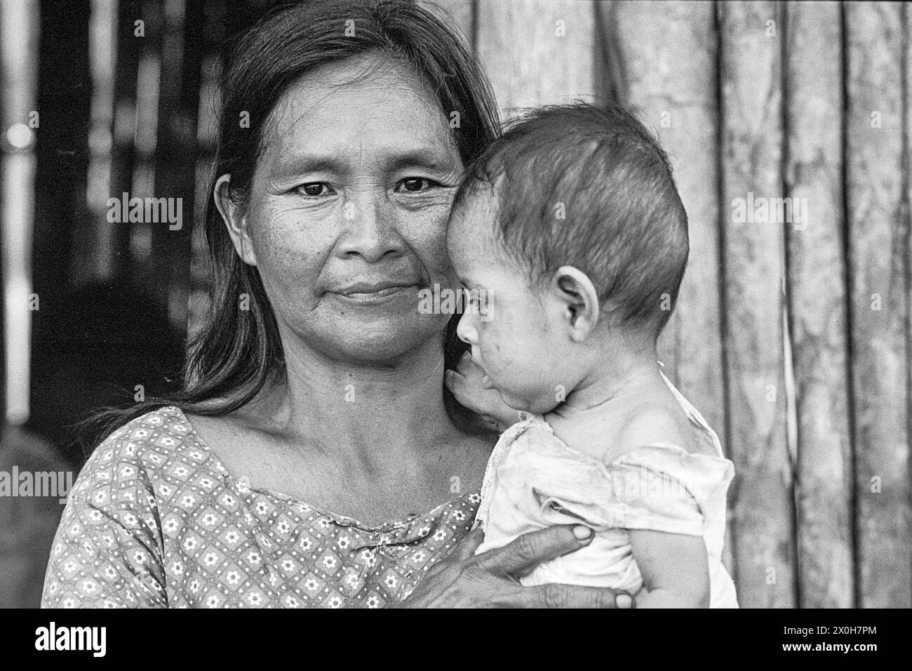 The mother from the Amazon lowlands proudly shows off her baby ...