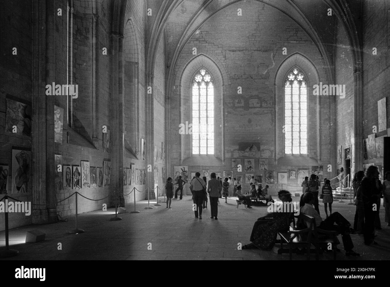 View into a church. An exhibition of Piccasos is taking place inside ...