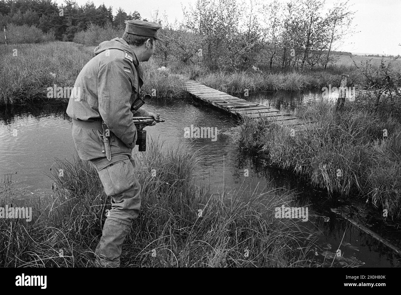 Troop exercise: A soldier during a shooting exercise. [automated ...