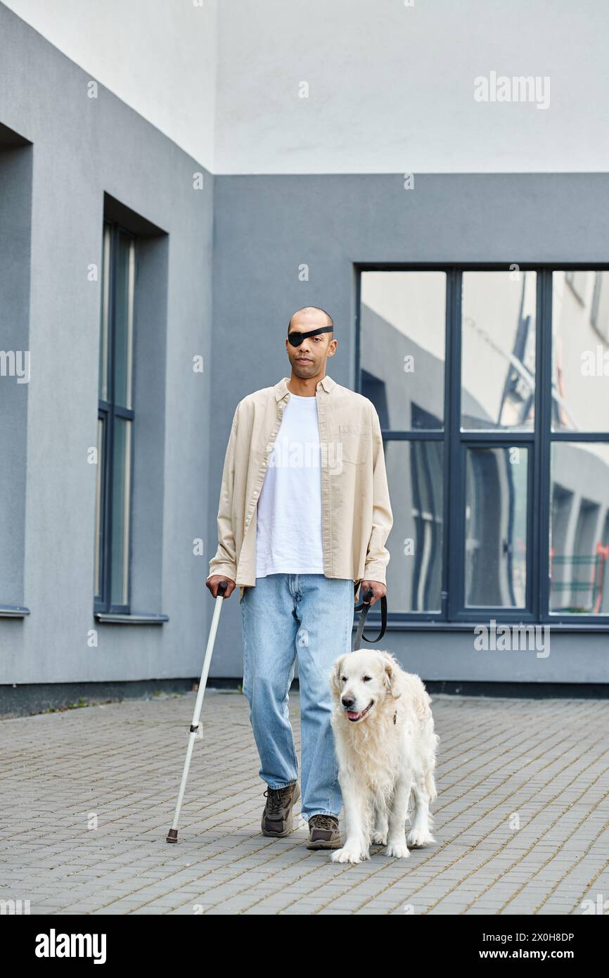 An African American man with myasthenia gravis walks with a Labrador ...