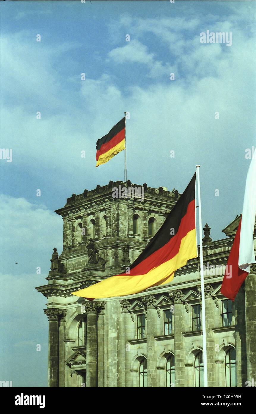 German flags on the Reichstag building on the occasion of the ...