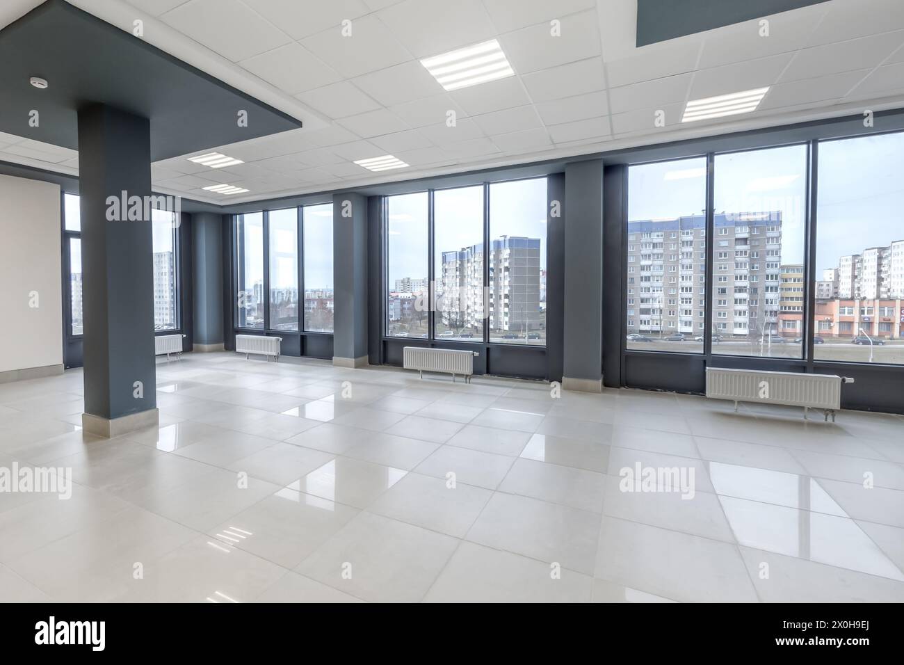 panorama view in empty modern hall with columns, doors, stairs and ...