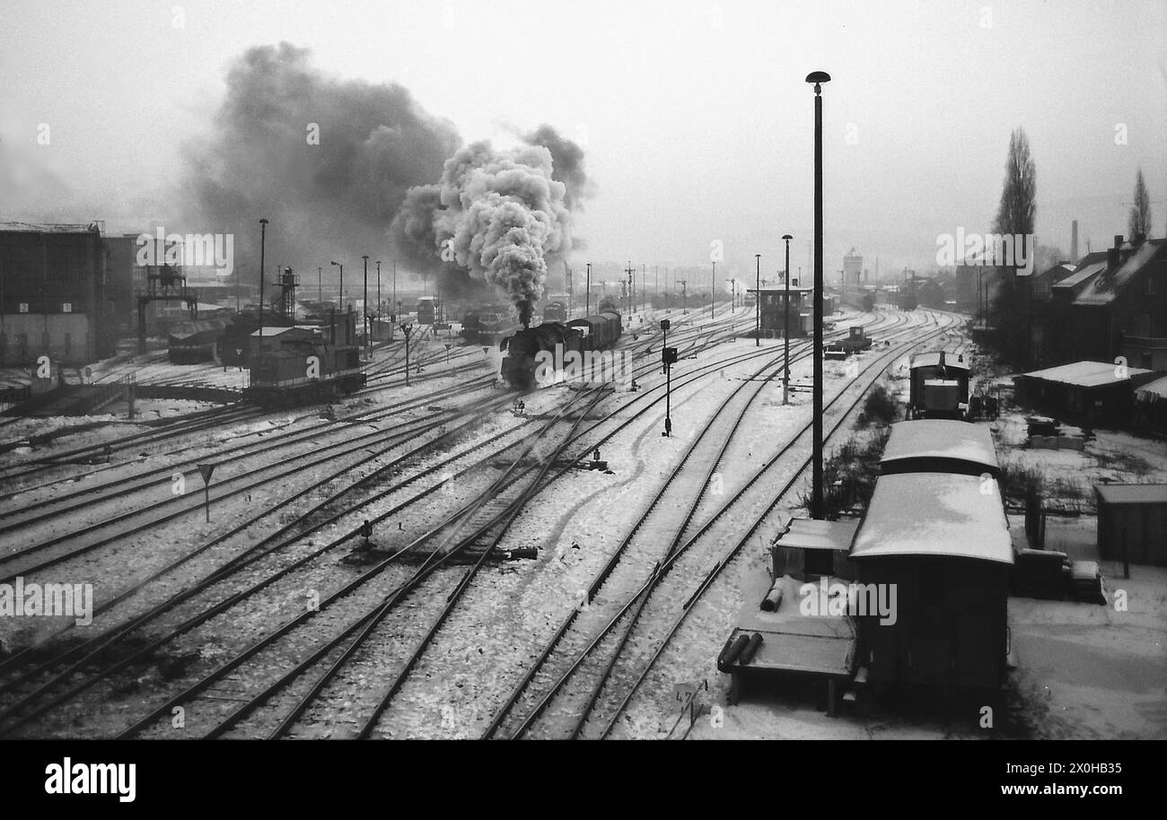 A freight train pulled by a BR 41 1273-6 steam locomotive at Saalfeld ...