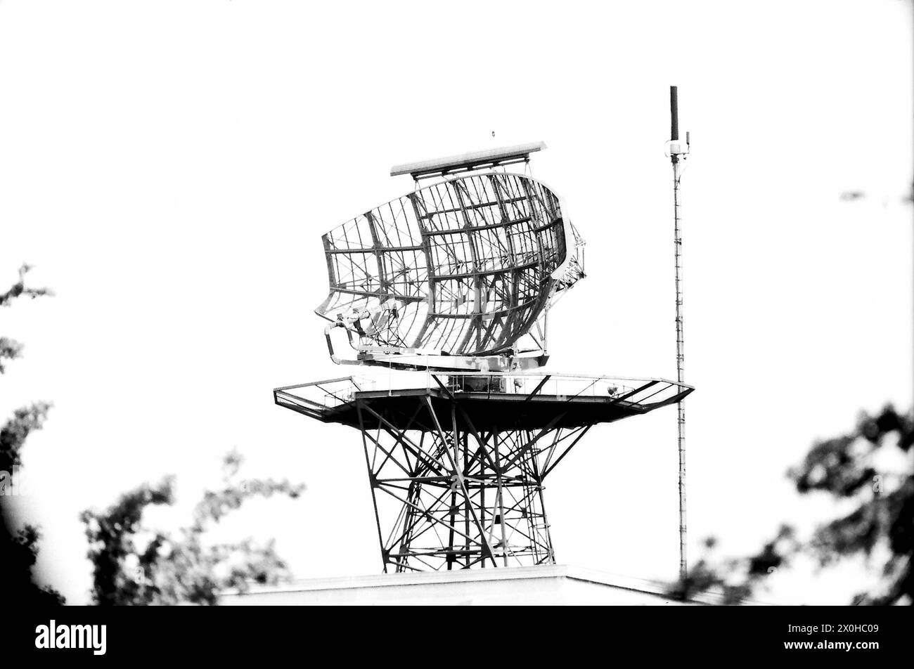 The radar device on the roof of the airport building is also one of the ...