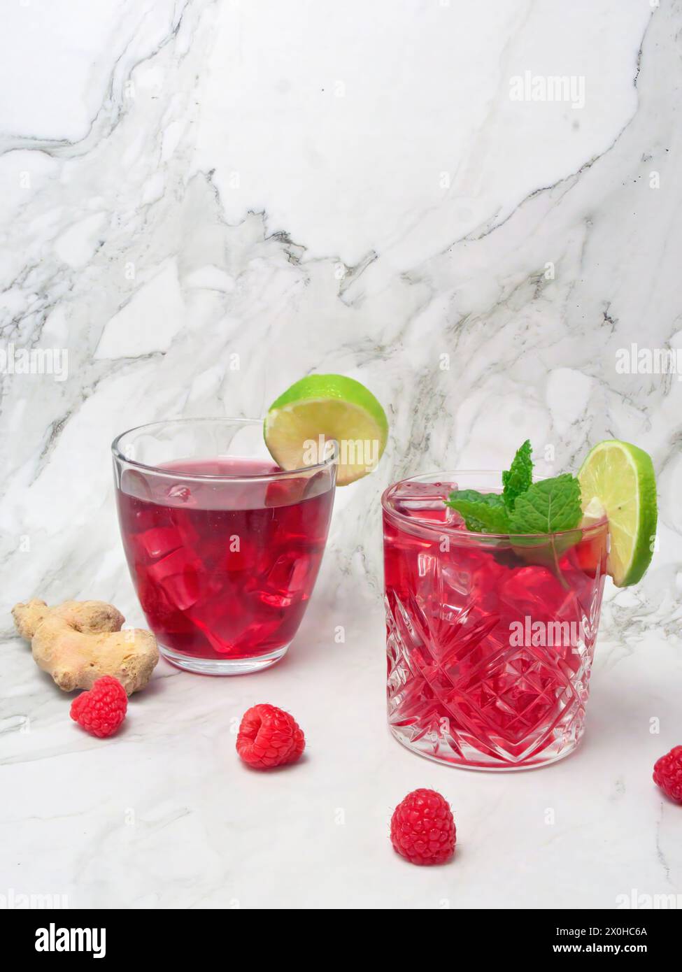 Spring or summer cold mocktail, raspberry lemonade and lime Stock Photo ...