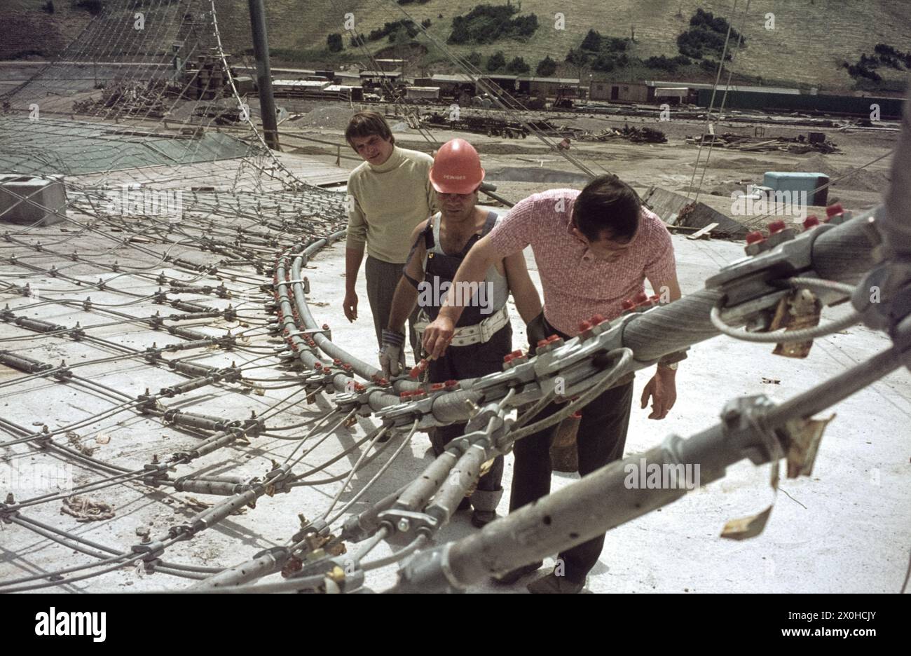 A master painter explains how to apply the red anti-corrosion paint to ...