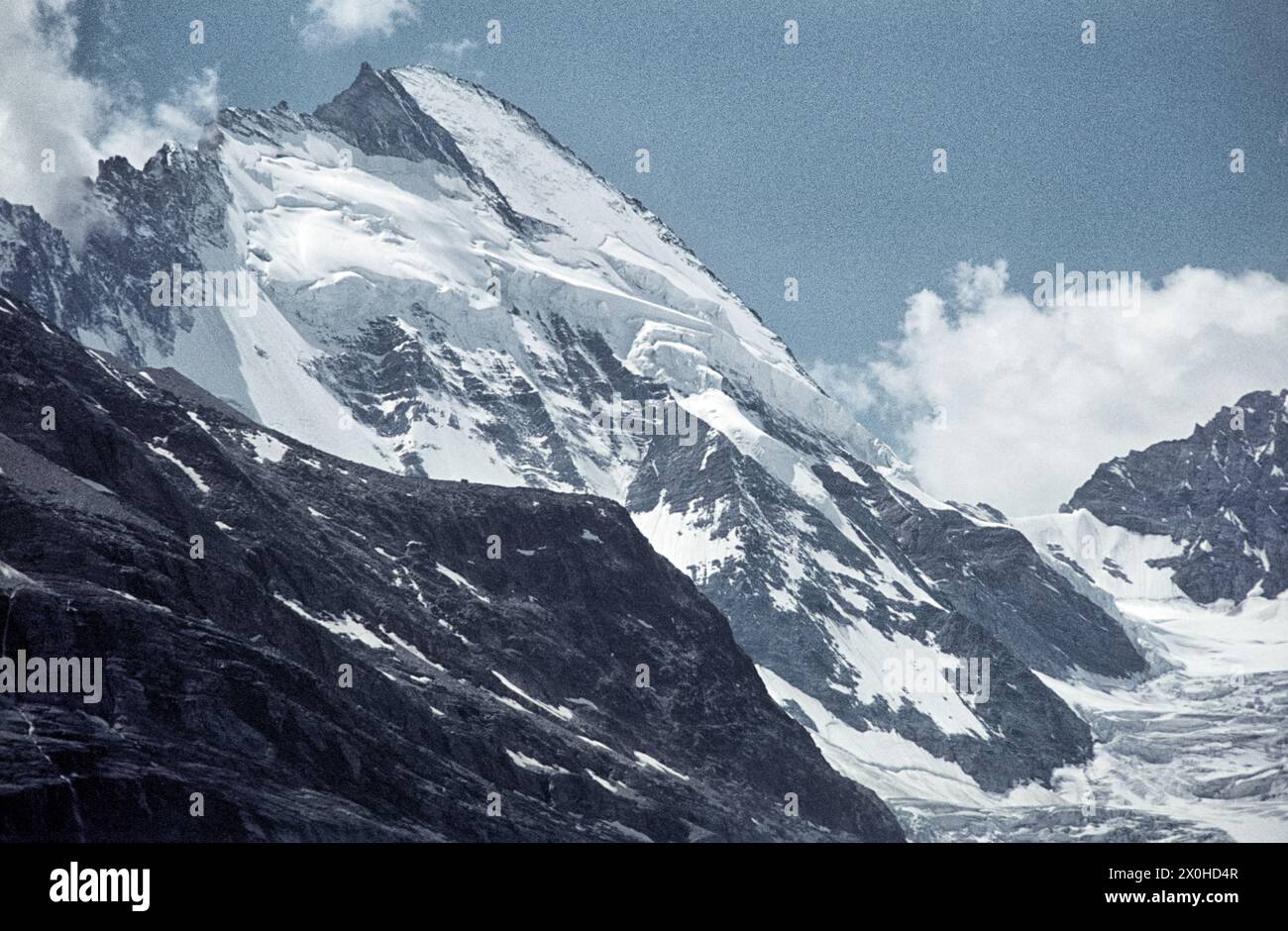 The four-thousand-meter peak with the Zmutt glacier in the Zmutt valley ...