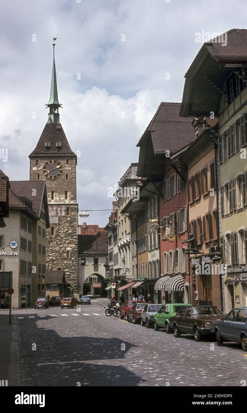 View from the alley towards the Upper Tower and the Upper Gate. Cars ...