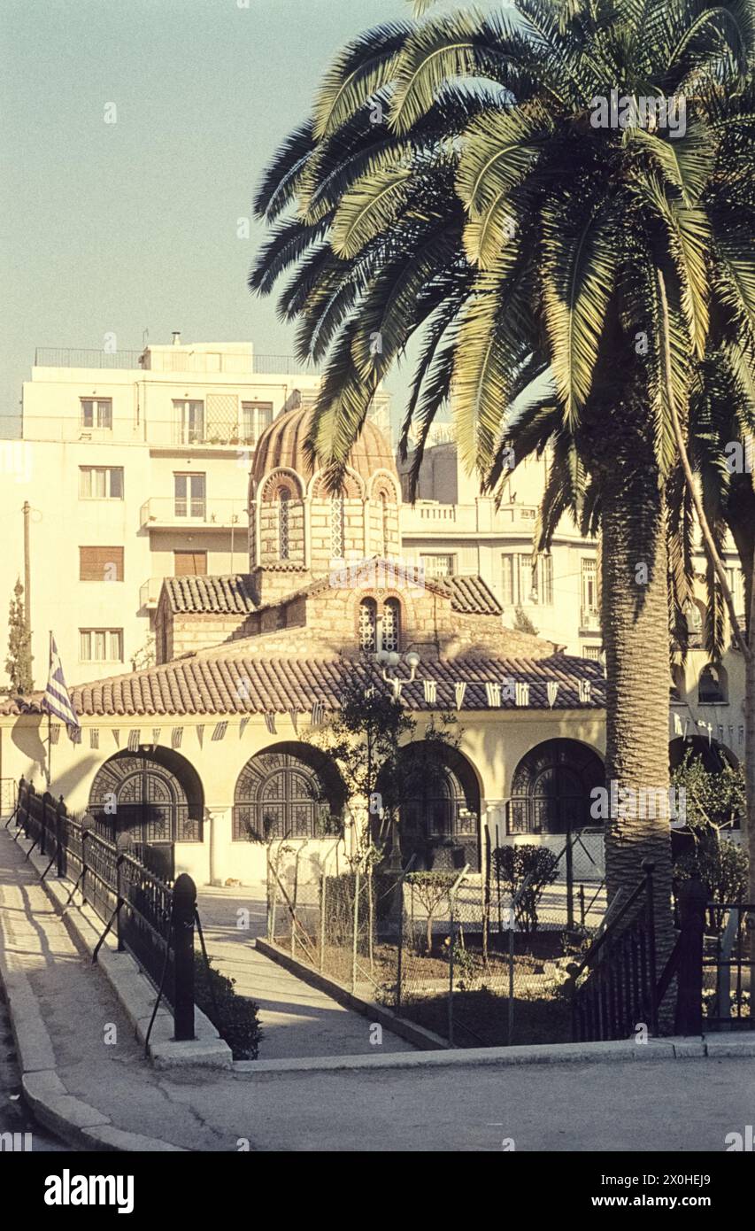 Greek Orthodox church, built on an old Greek temple. A palm tree in ...