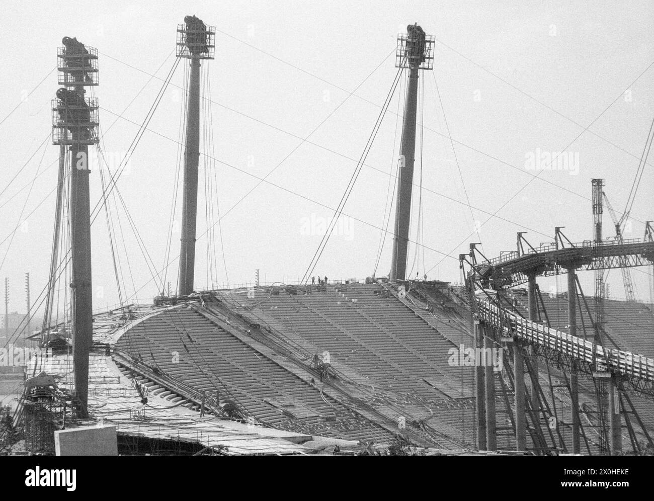 The Olympic Stadium under construction. Stands with supports for the ...