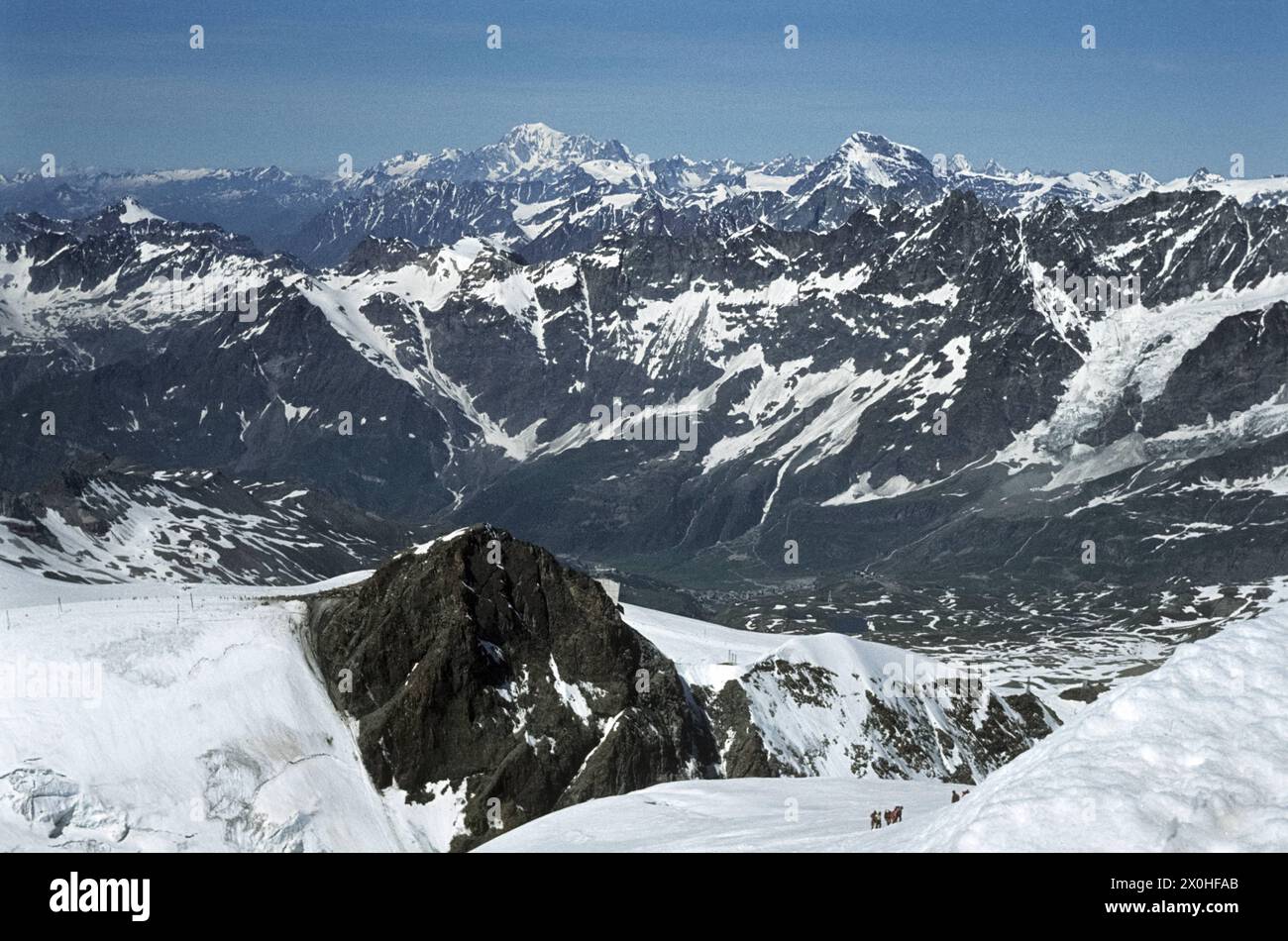 Panorama from the Breithorn summit towards the Mattertal valley. The ...