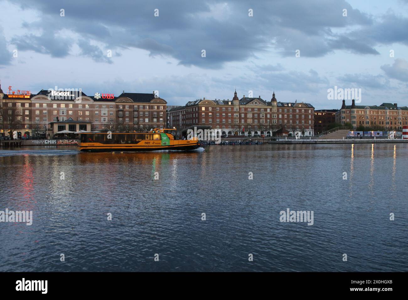 Yellow boat bus at dusk in Copenhagen Harbour Denmark April 2024 Stock ...