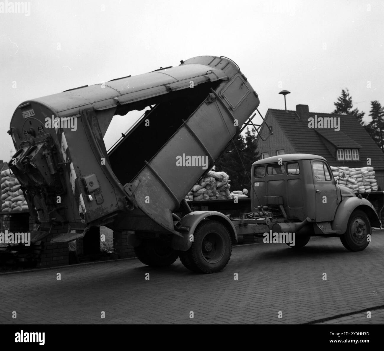 Garbage collection in 1960 Stock Photo - Alamy