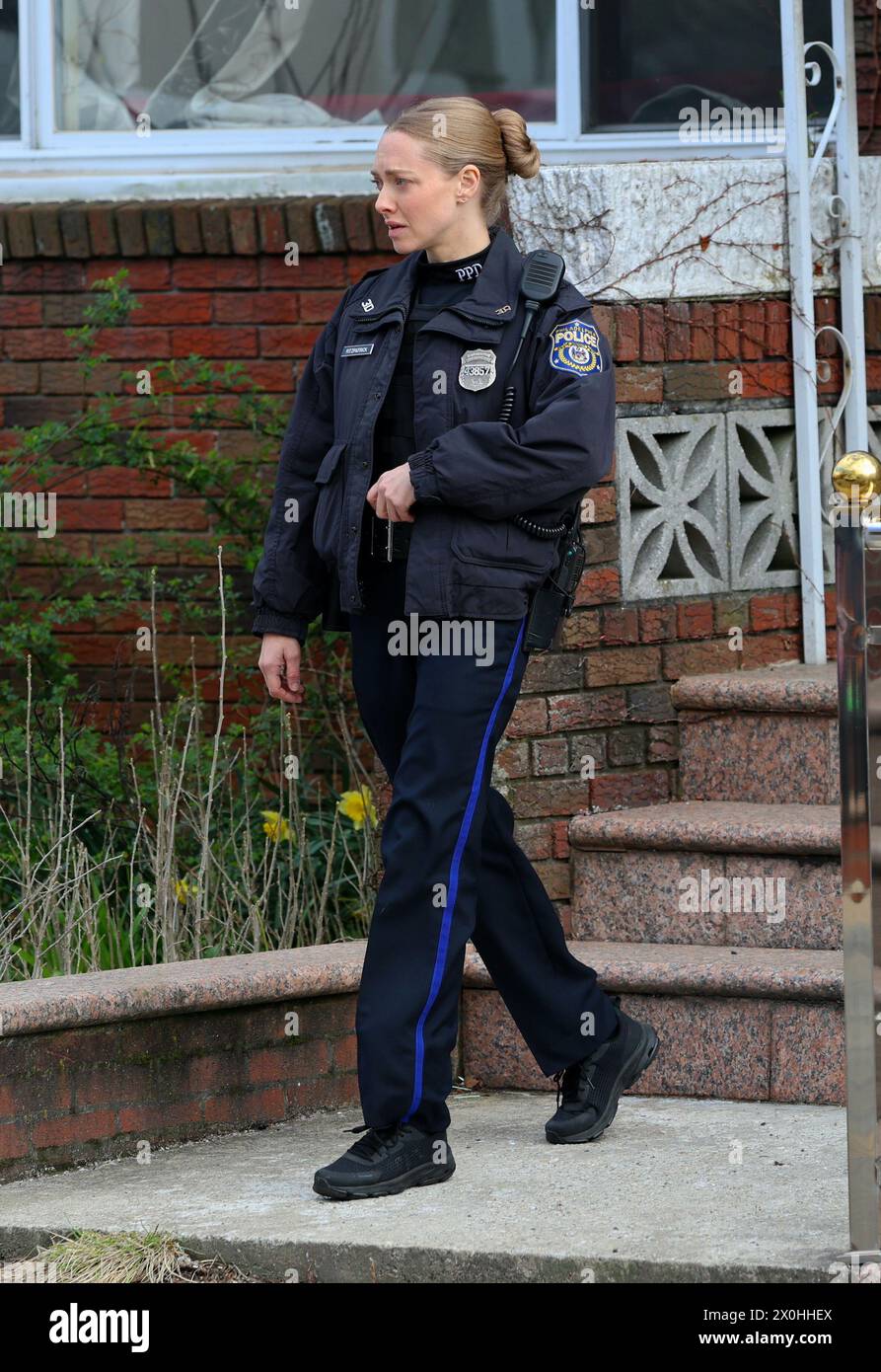 Amanda Seyfried wearing a Philadelphia Police Uniform filming at the ...
