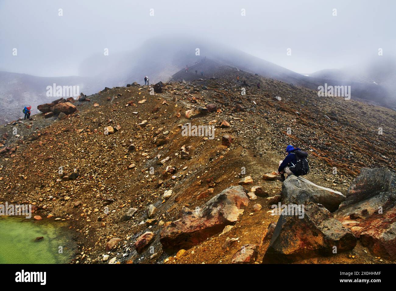 Hikers along Tongariro Alpine Crossing trail, Tongariro National Park ...