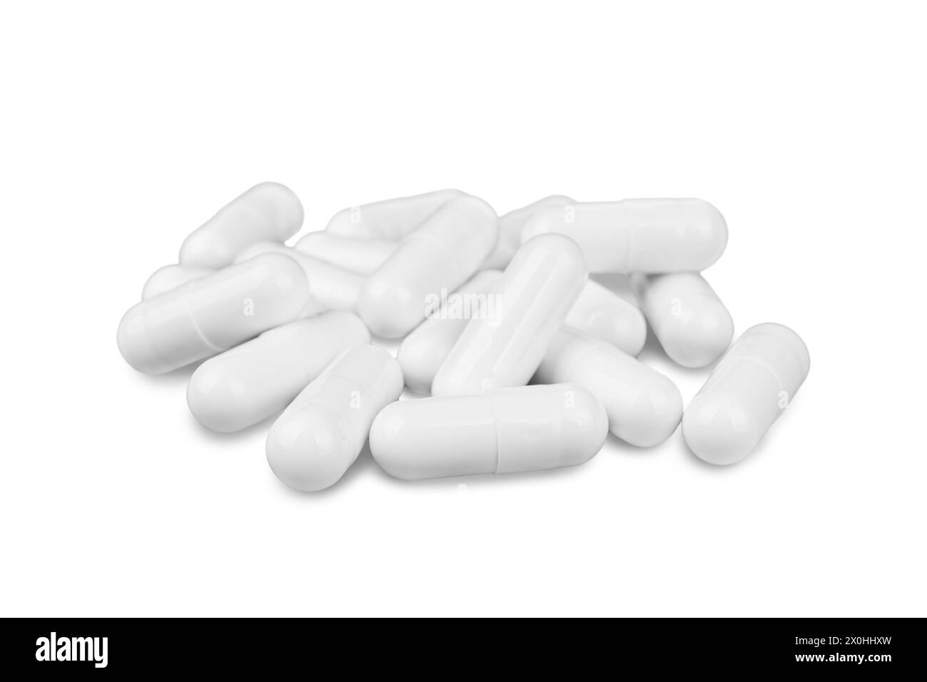 Heap of white medicine pill capsules isolated on white background. Pile ...