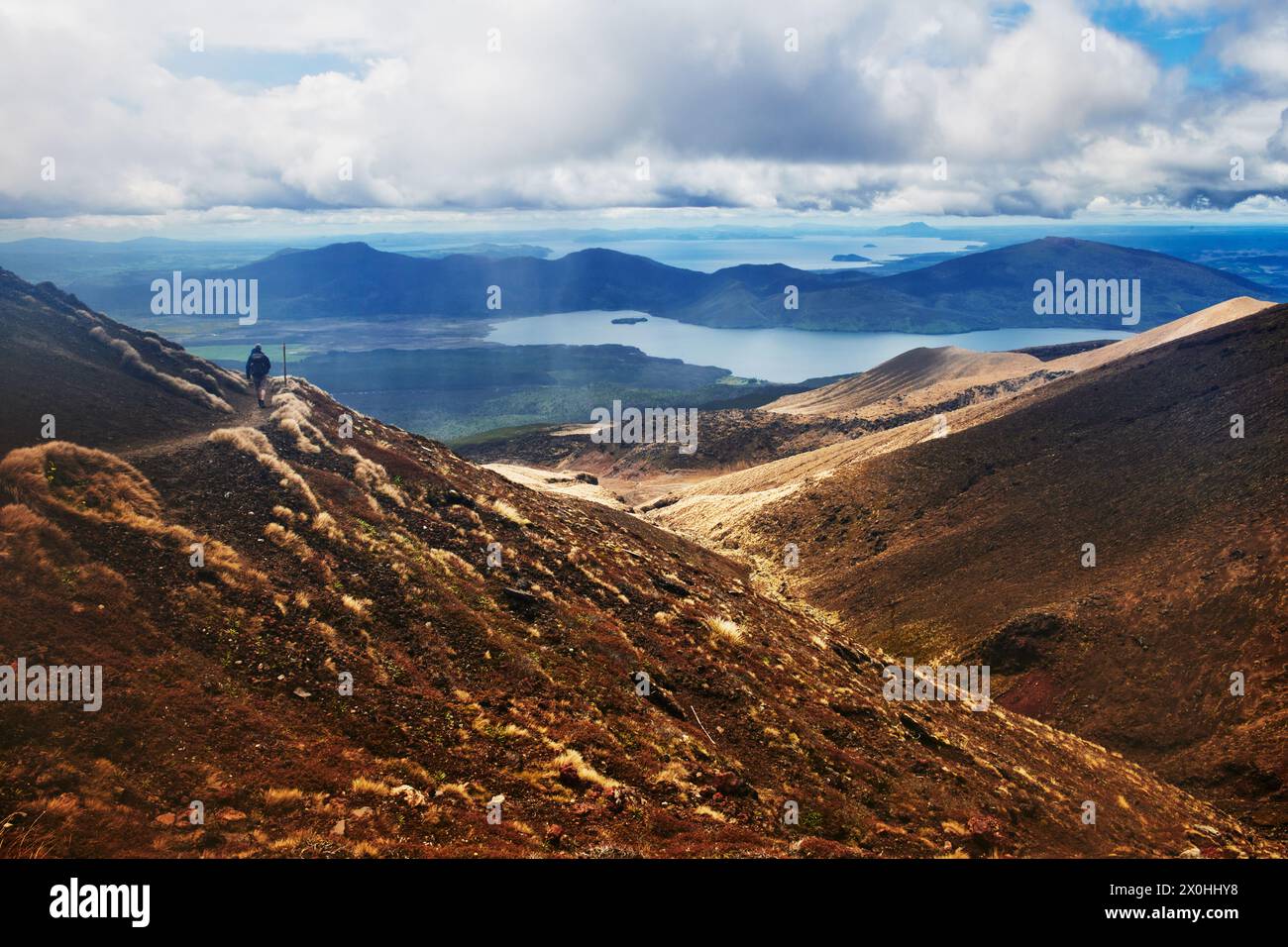 Hikers along Tongariro Alpine Crossing trail, Tongariro National Park ...