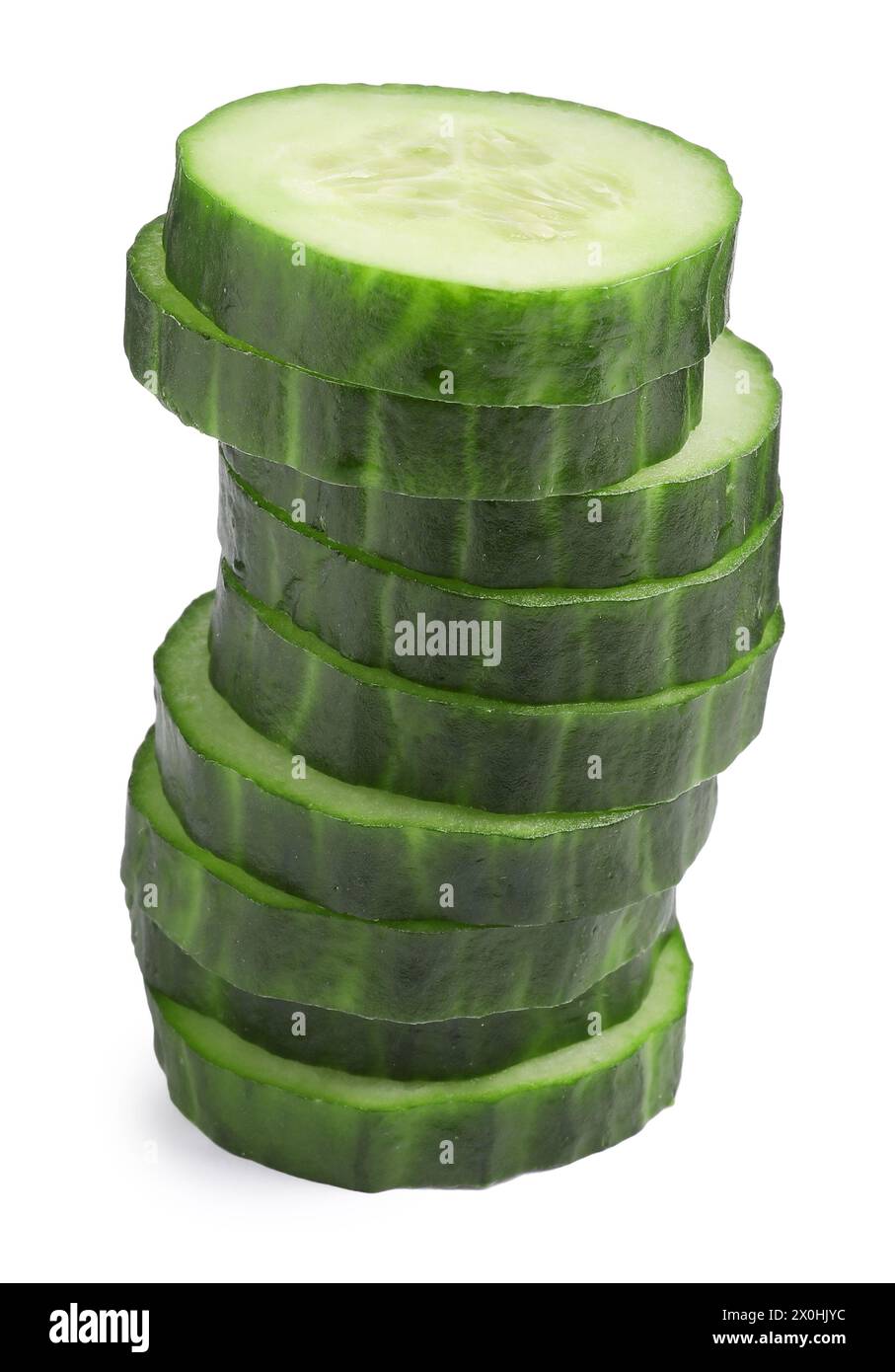 Stack of fresh cut cucumber isolated on white Stock Photo - Alamy