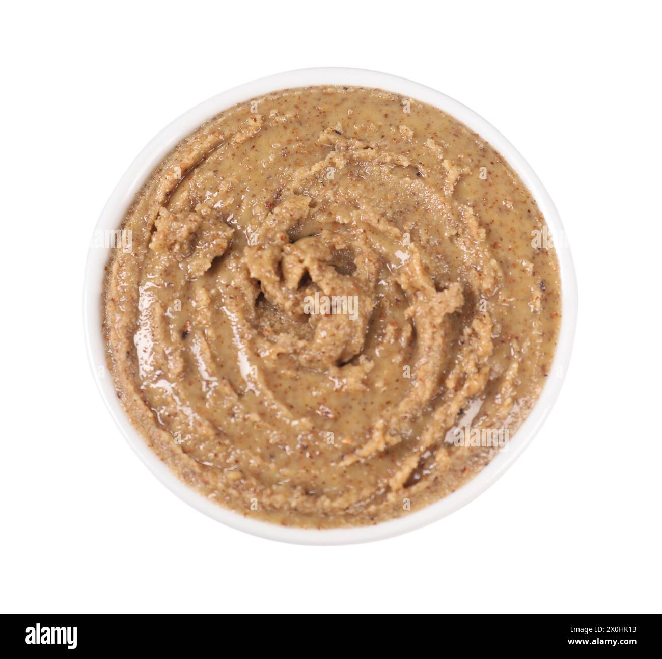 Delicious nut butter in bowl isolated on white, top view Stock Photo ...