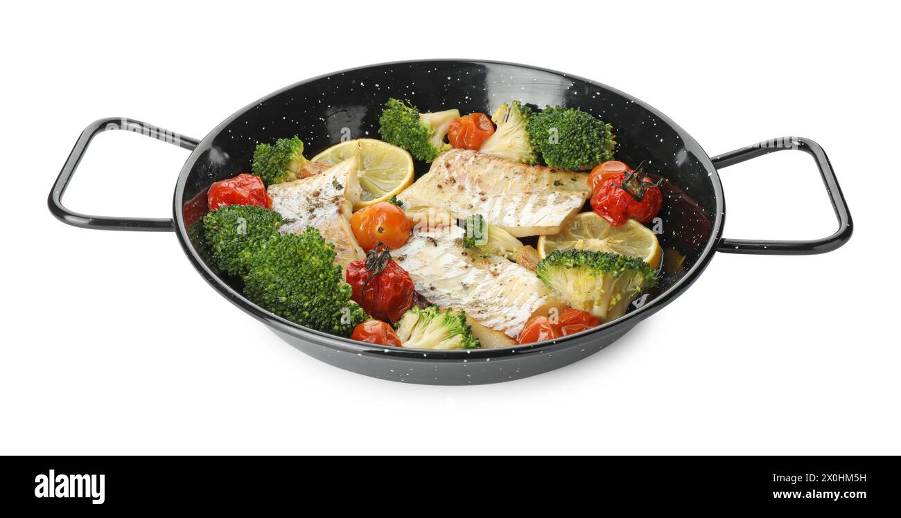Tasty cod cooked with vegetables in frying pan isolated on white Stock ...