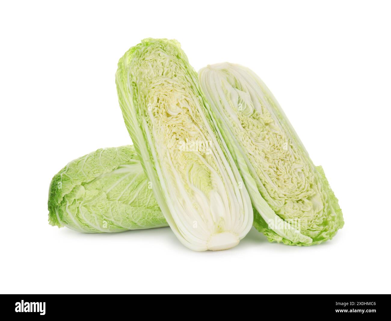 Whole and halves of Chinese cabbages isolated on white Stock Photo - Alamy