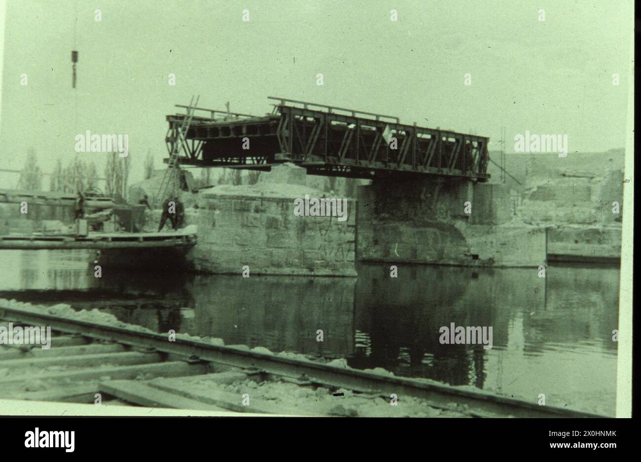 In 1957, the Old Main Bridge was rebuilt with a concrete beam over the ...
