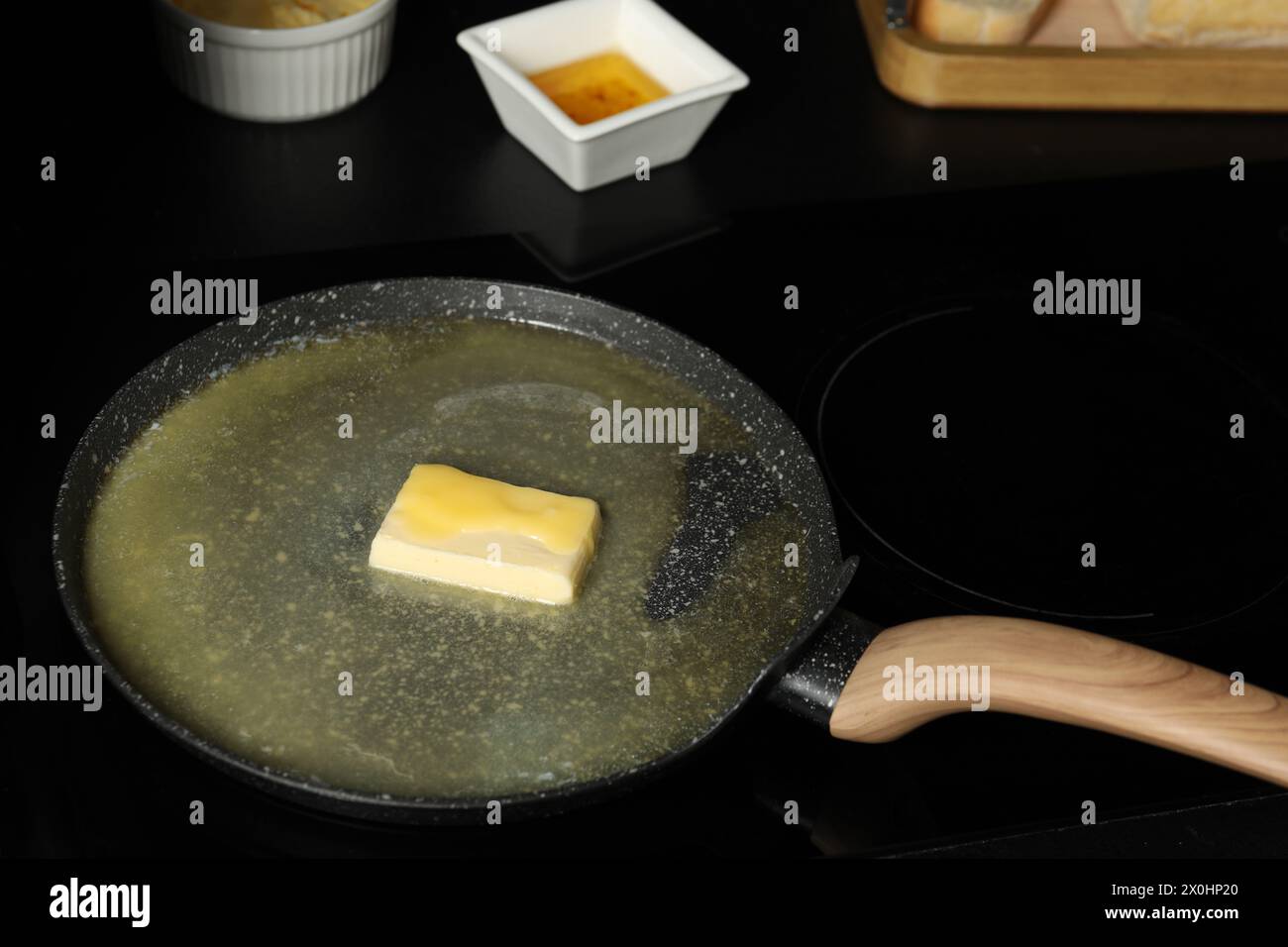 Margarine in hot frying pan hi-res stock photography and images - Alamy