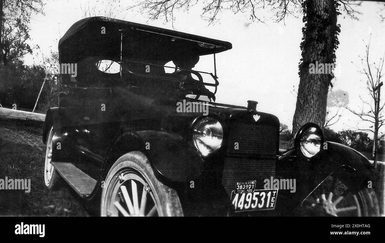 Vintage car next to a tree [automated translation] Stock Photo - Alamy