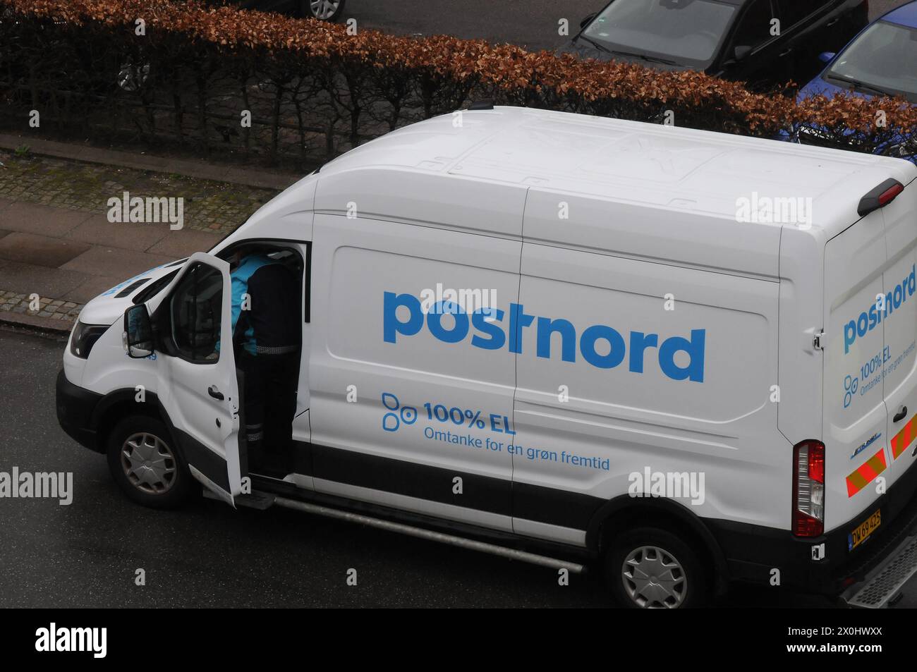 Copenhagen, Denmark /12 April 2024/.Postnord parcels and packets ...