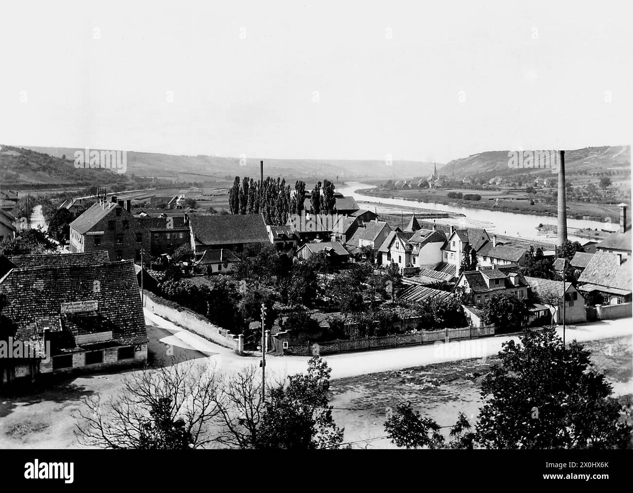 in the background on the right on the Main, tree trunks are assembled ...