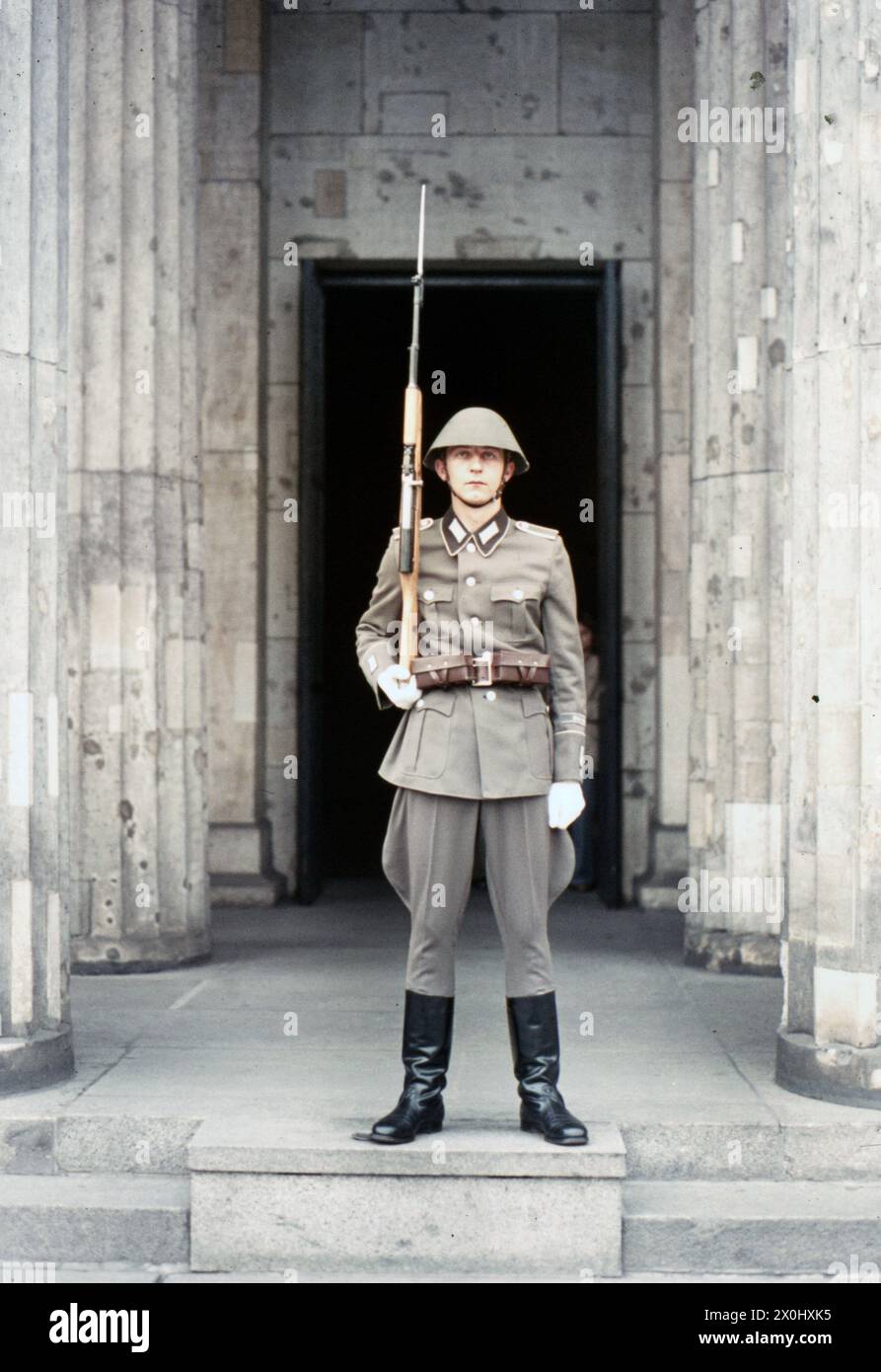 "A soldier of the NVA with rifle guards the entrance of the ""Neue ...