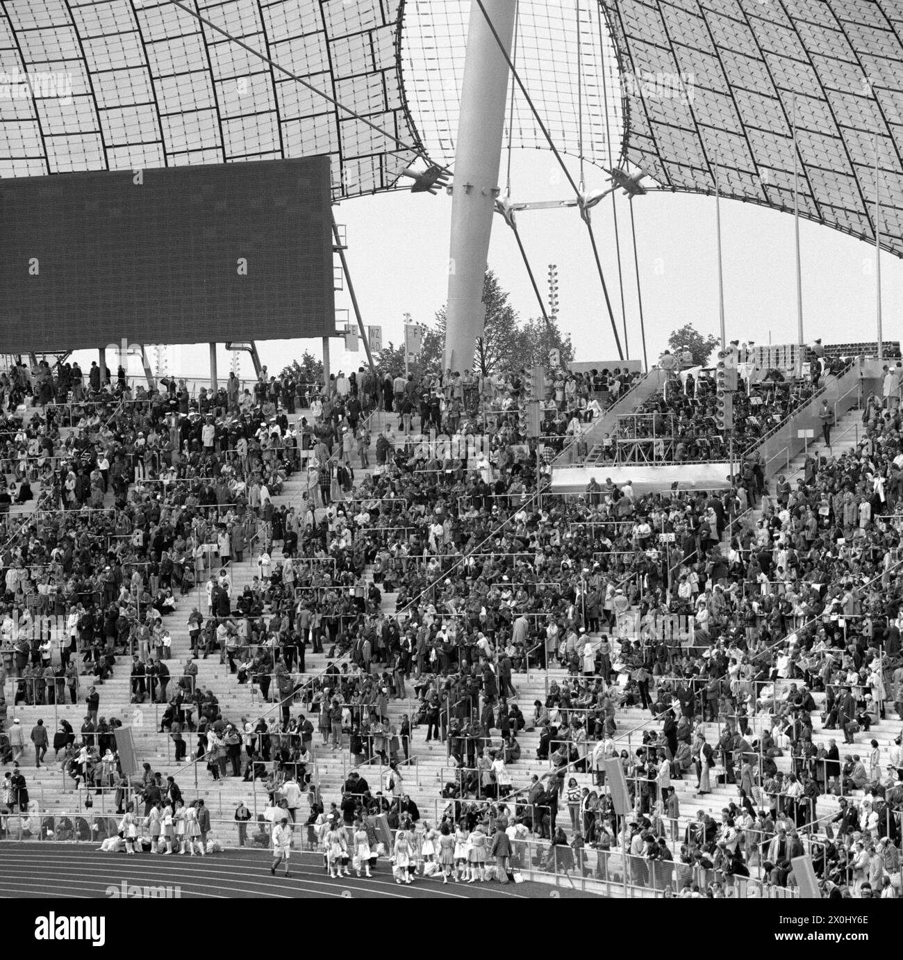 Spectators in the Olympic Stadium in Munich during the Olympic Games ...