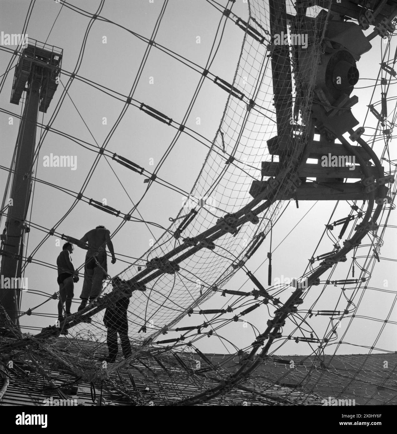 View of the construction of the tent roof of the Munich Olympic Stadium ...