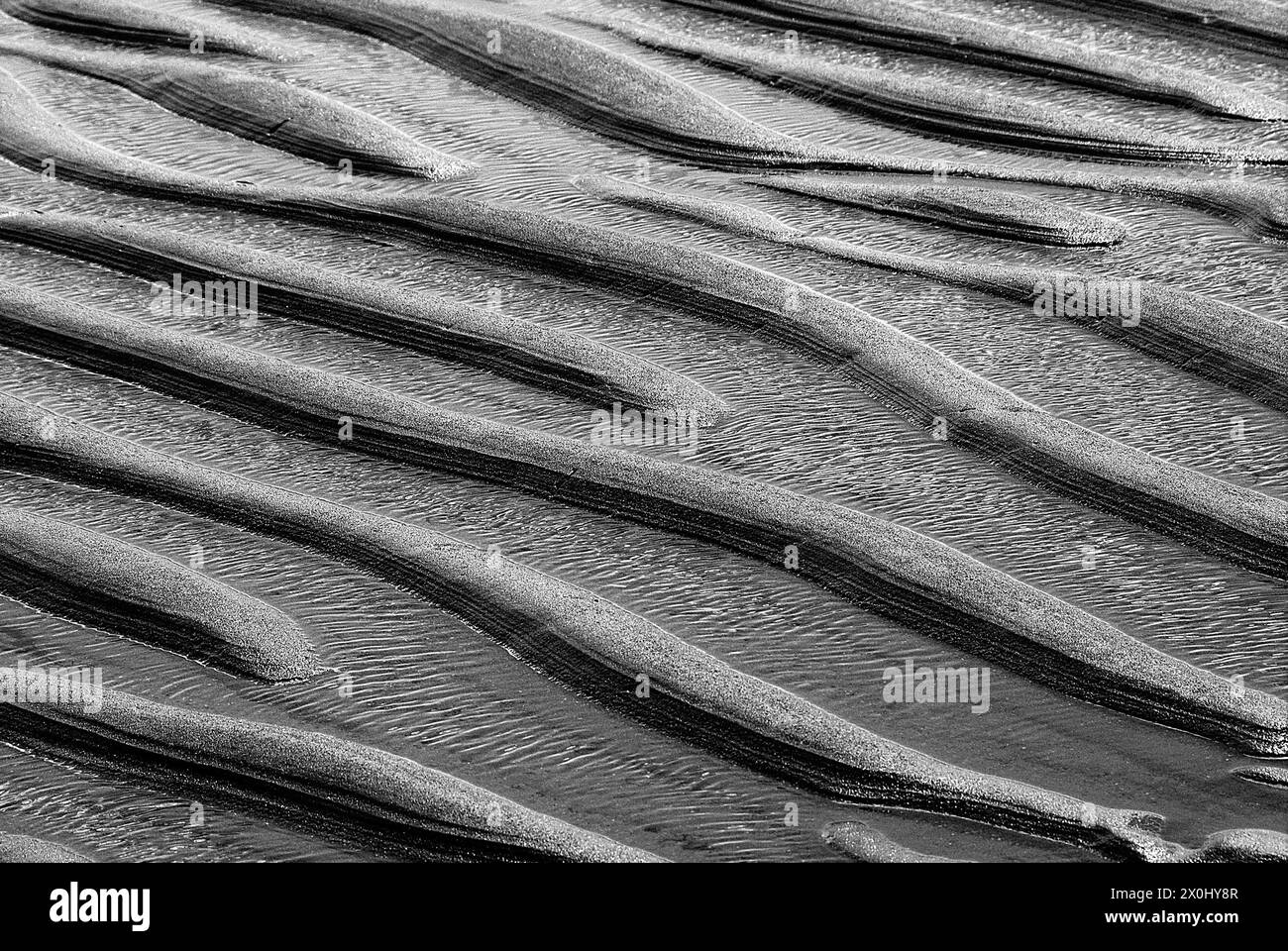 Sand formations during low tide on the Grande Côte before La Barre de ...
