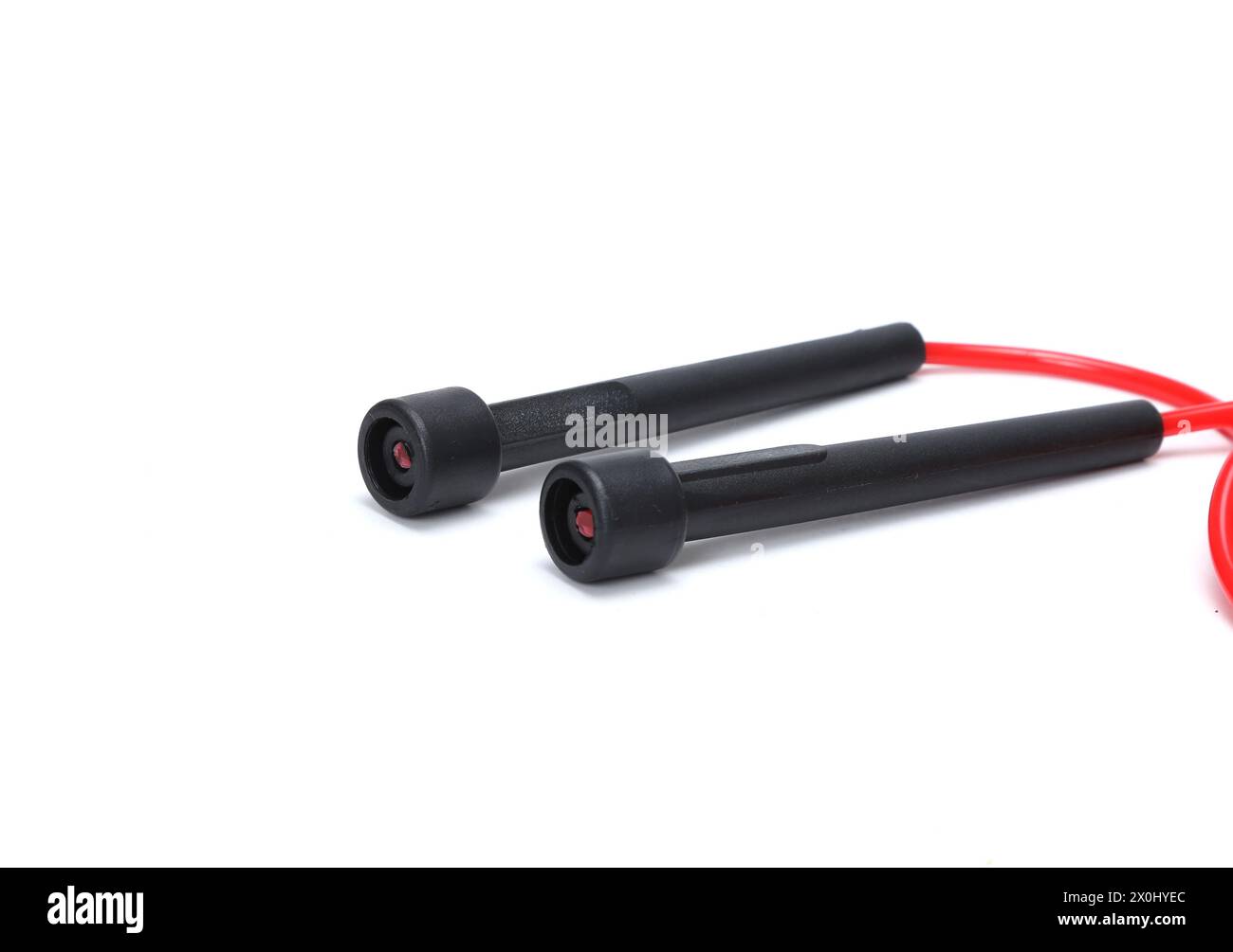 red black skipping rope isolated on white background Stock Photo - Alamy