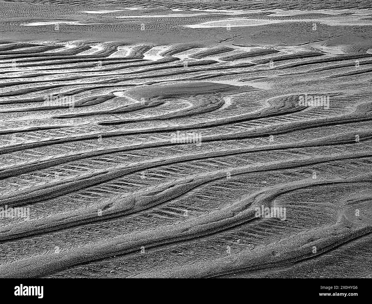Sand formations during low tide on the Grande Côte before La Barre de ...