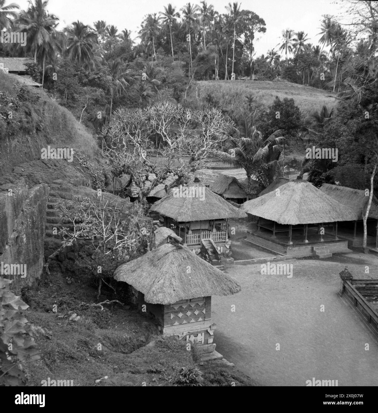 View over a temple complex on Bali in Indonesia. The complex consists ...