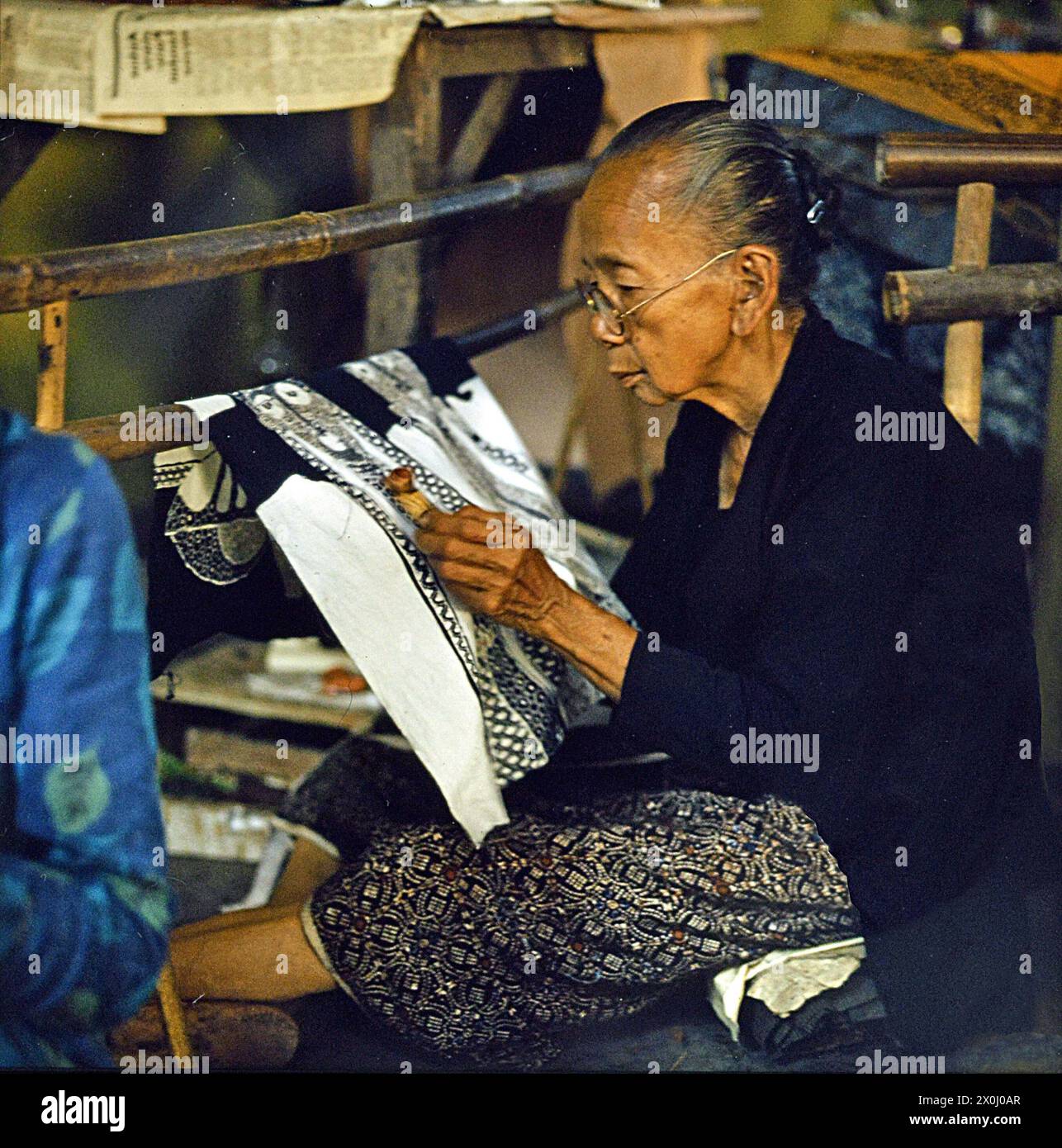 Elderly woman embroidering patterns hi-res stock photography and images ...