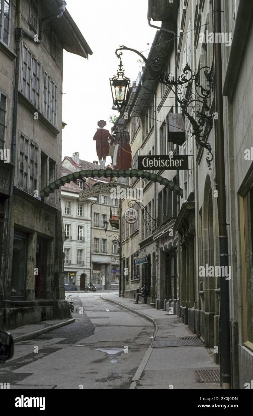 "View of the inscription arch on which a tinsmith has placed the ...