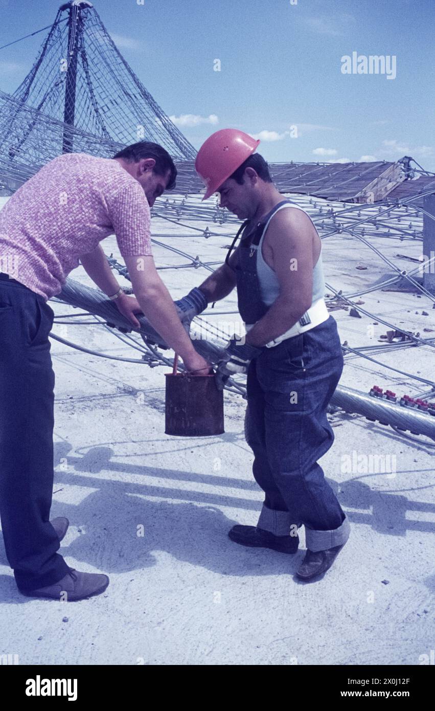 A master painter explains how to apply the red anti-corrosion paint to ...