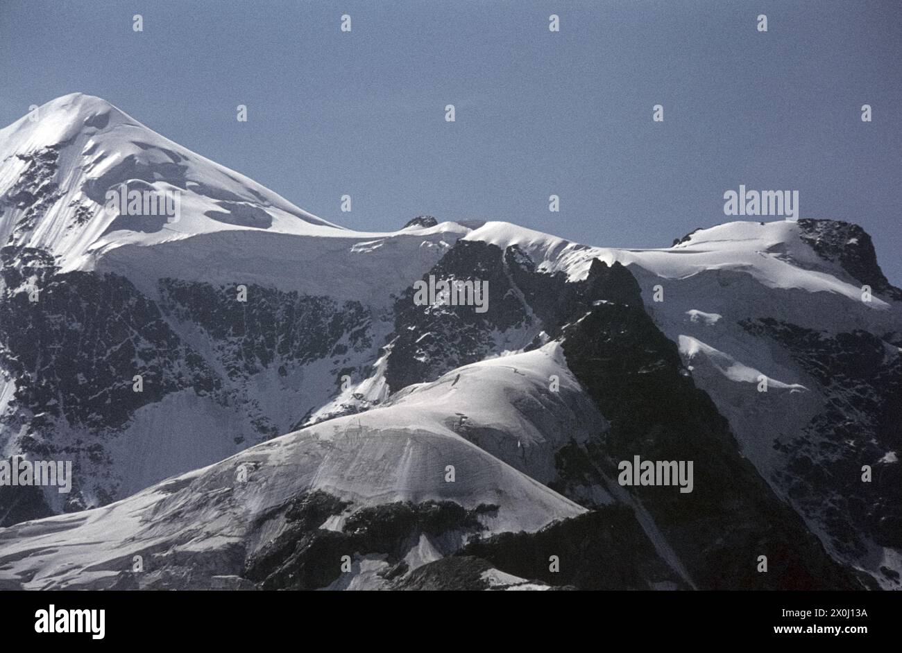 Panorama at the Tschierva hut. View to the northern summit of Piz Roseg ...