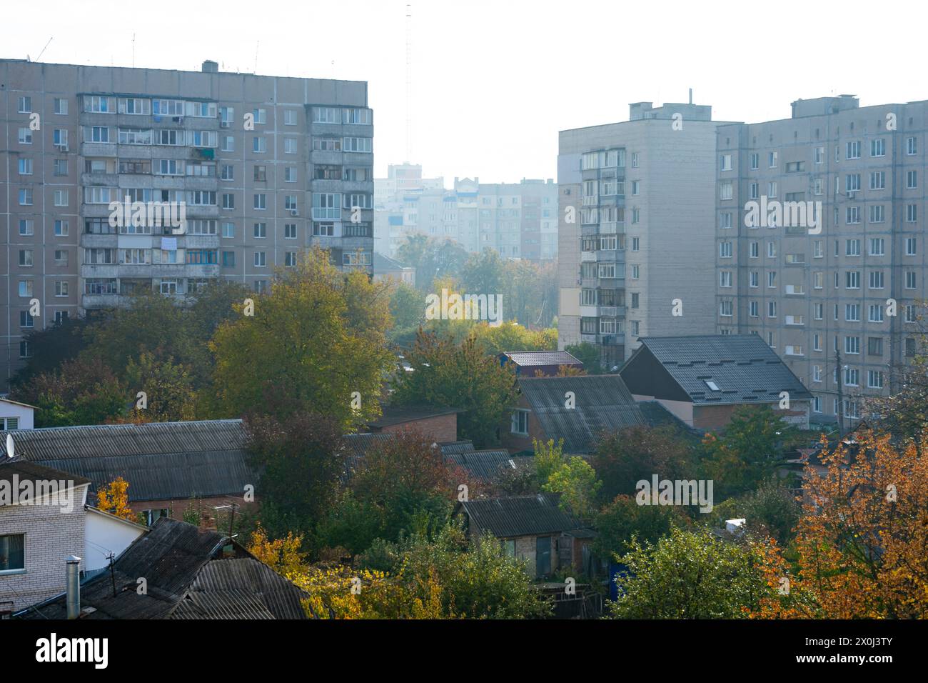 An urban landscape with tall tower blocks and skyscrapers surrounded by ...