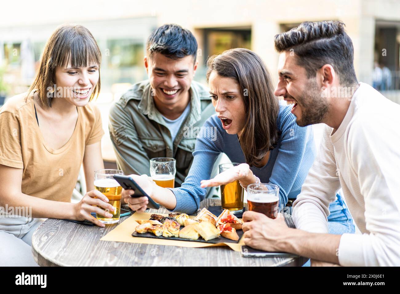 Spontaneous moments of friendship revealed. A diverse group of friends ...