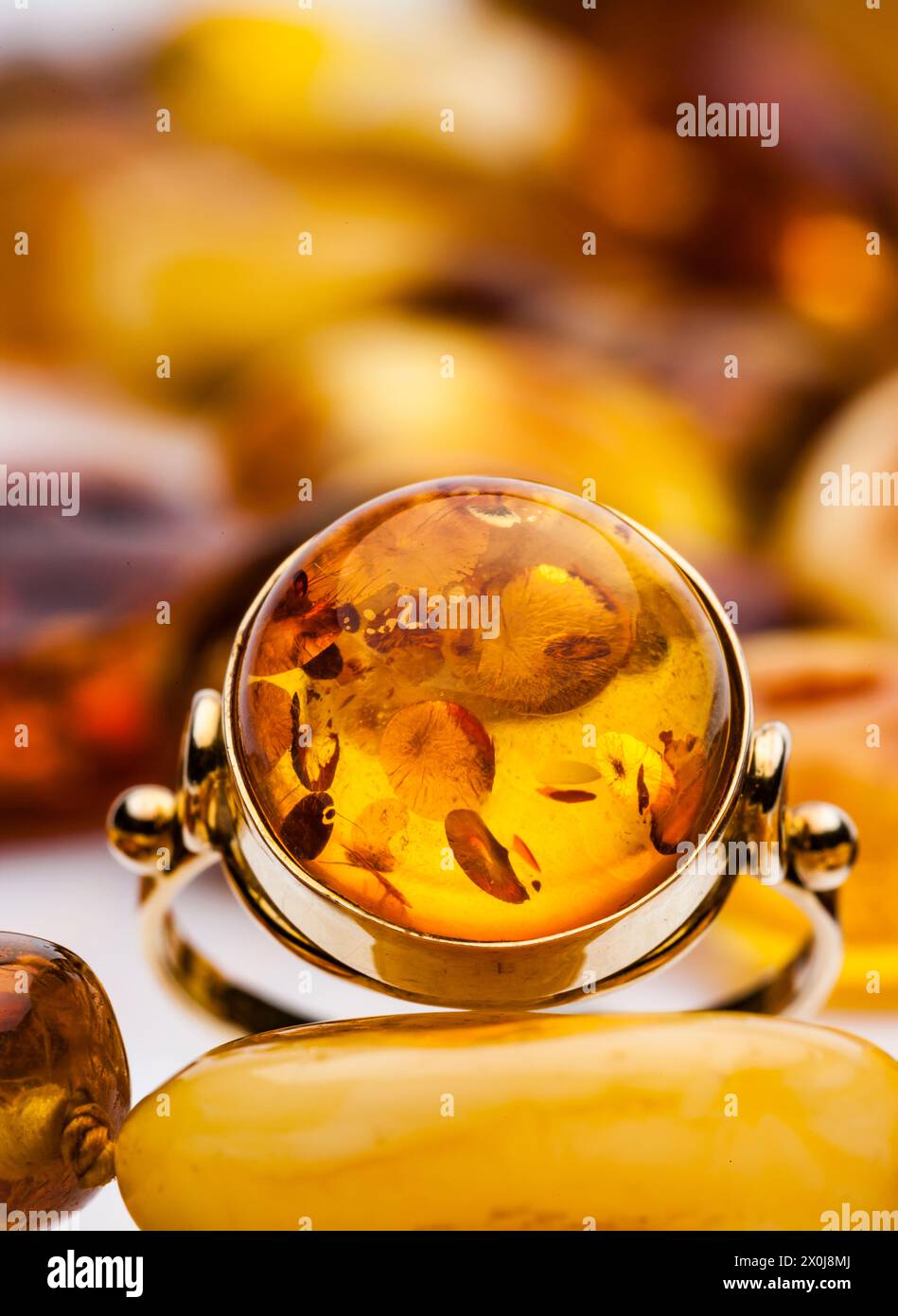 Genuine amber jewelry with an amber ring Stock Photo - Alamy