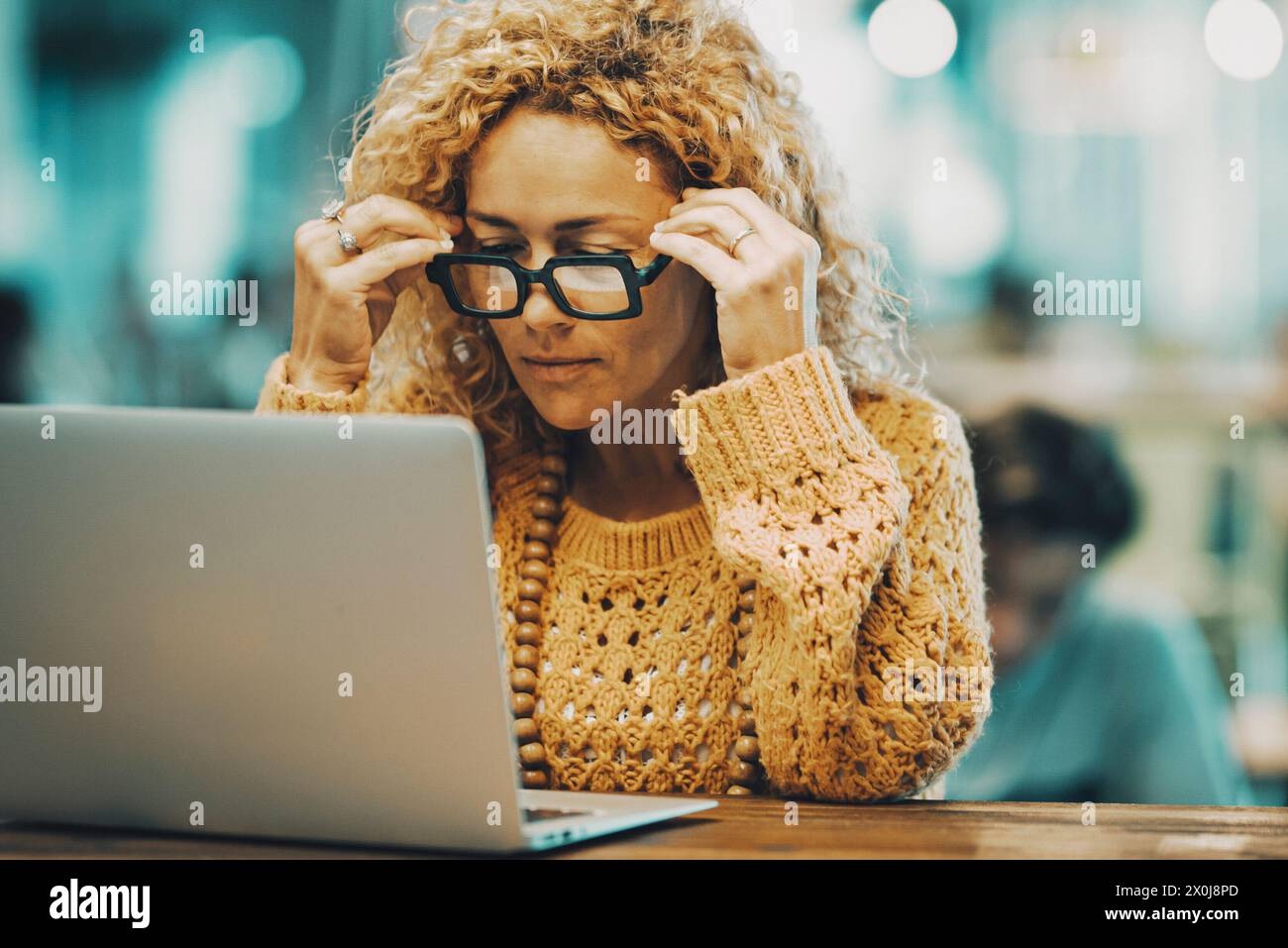 Concentrated and stressed caucasian adult woman at work on a laptop ...